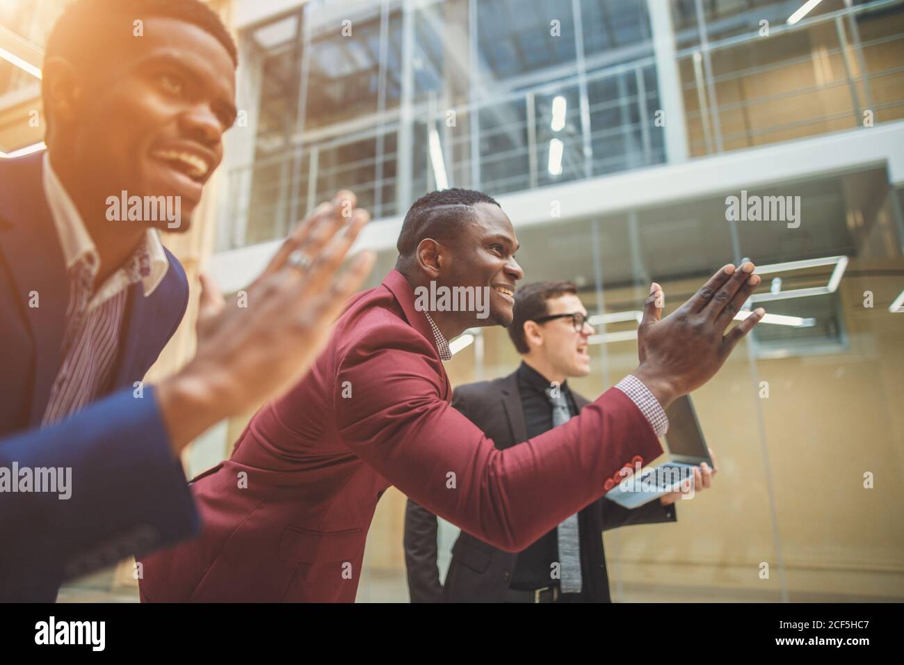 Photo of energetic business people in suits running Stock Photo - Alamy