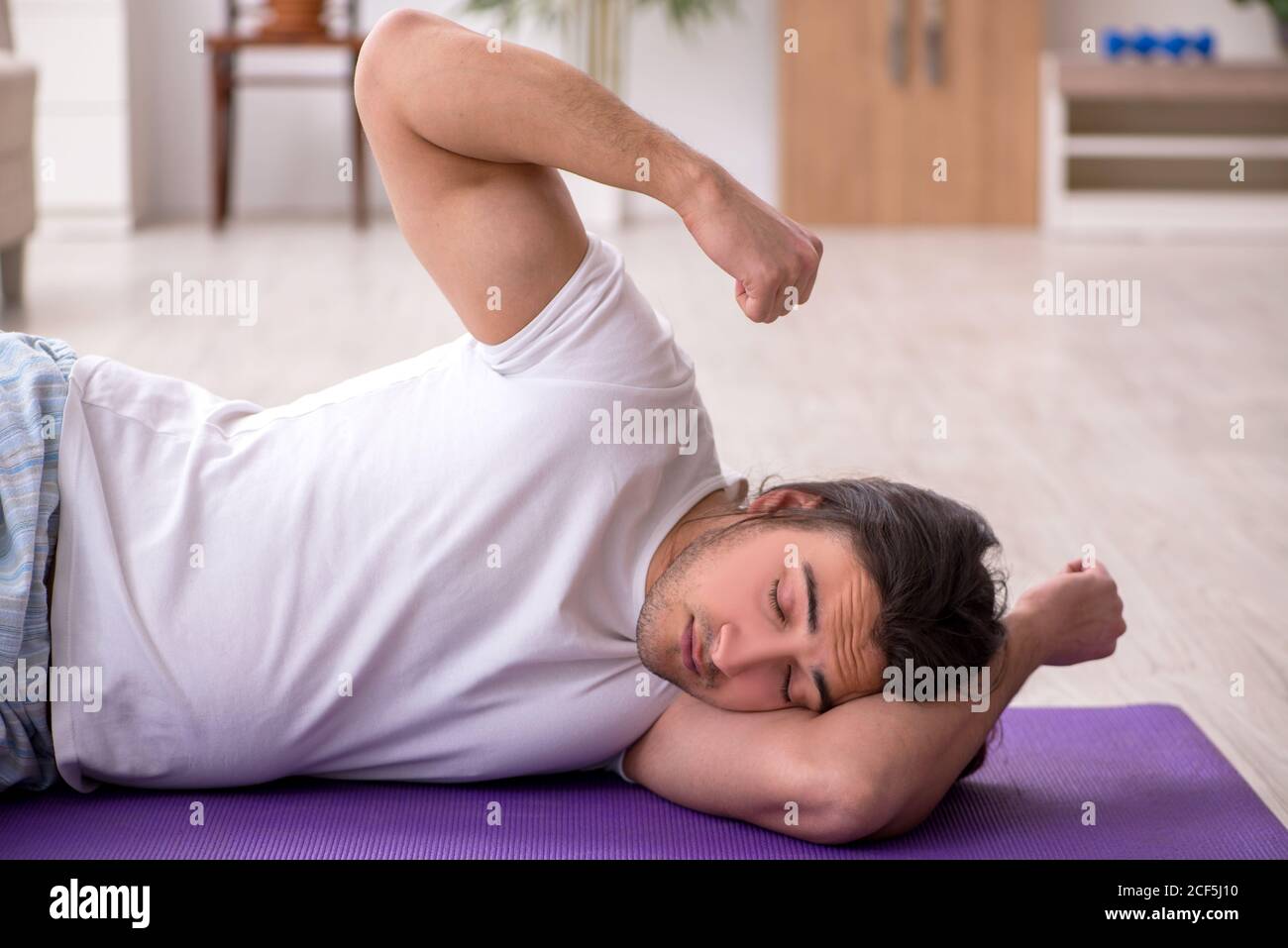 Man starting day with morning exercises Stock Photo - Alamy