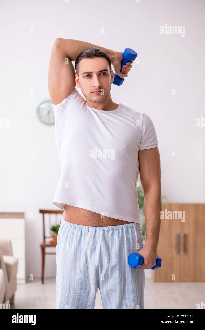 Man starting day with morning exercises Stock Photo - Alamy