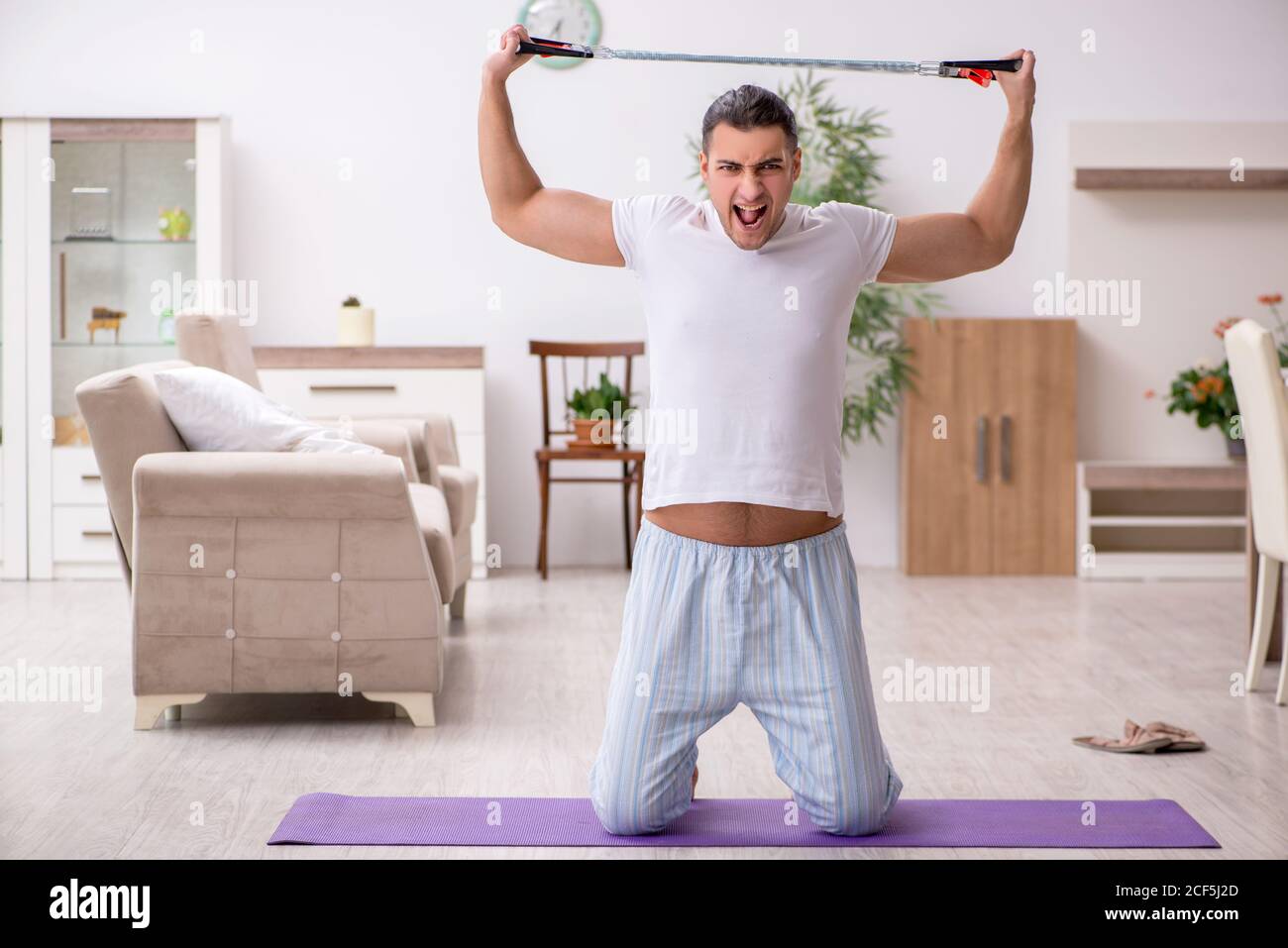 Man starting day with morning exercises Stock Photo - Alamy