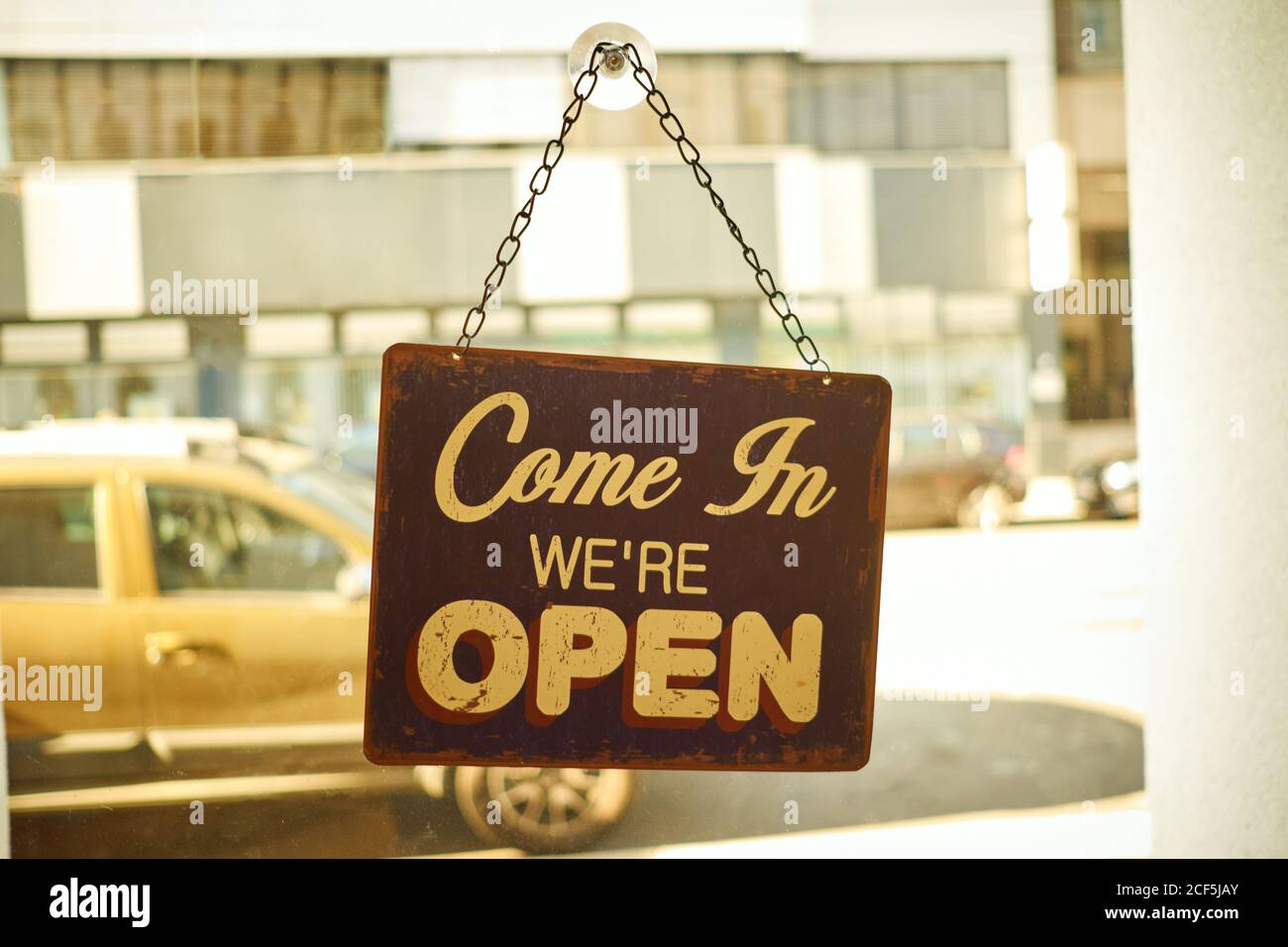 Open sign at small business window with blurred background Stock Photo ...
