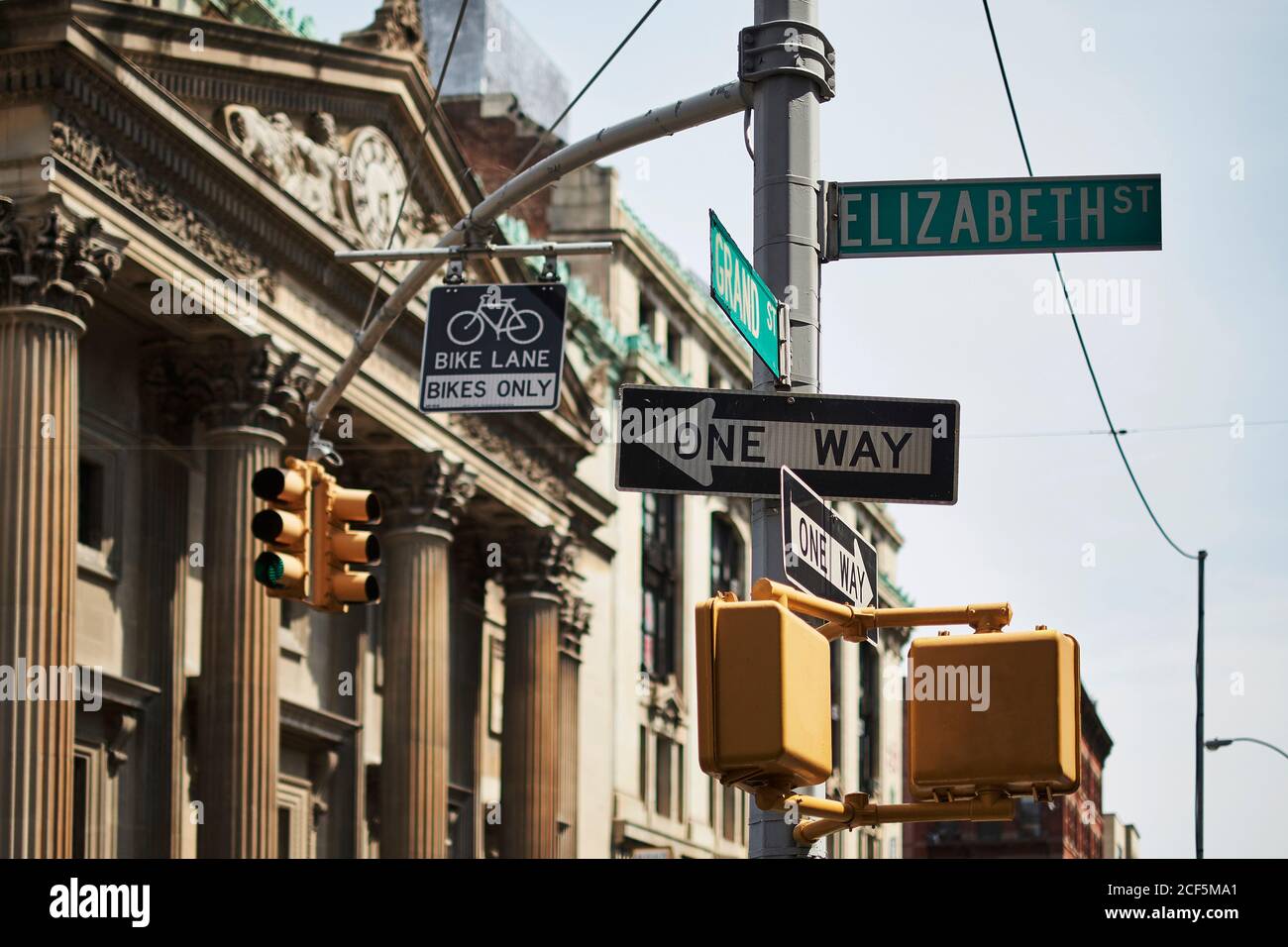 From below of one way traffic signs on crossroad with modern high ...