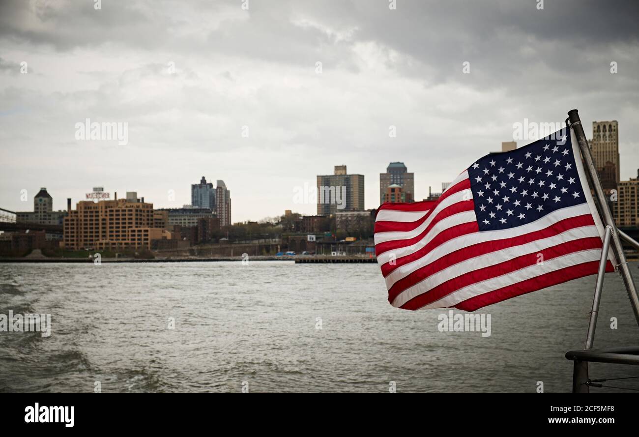 American flag on waterfront flagpole hi-res stock photography and ...