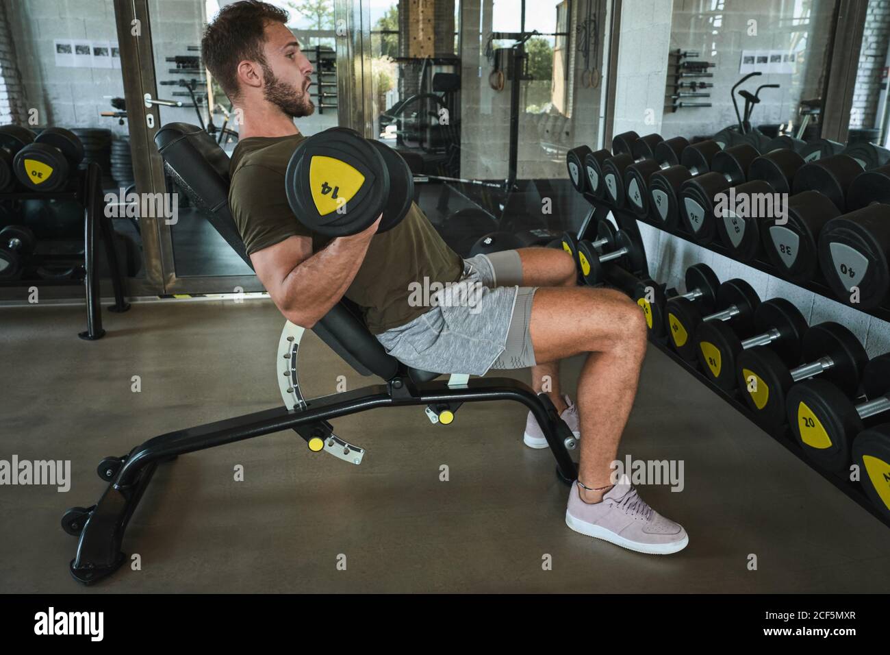 Strong man exercising hi-res stock photography and images - Alamy