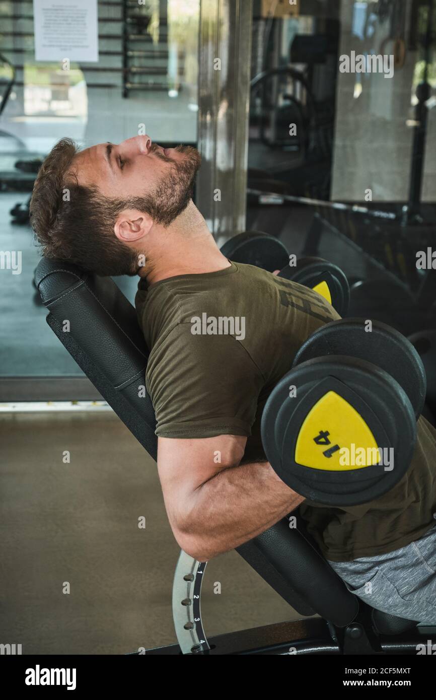 Strong man exercising hi-res stock photography and images - Alamy