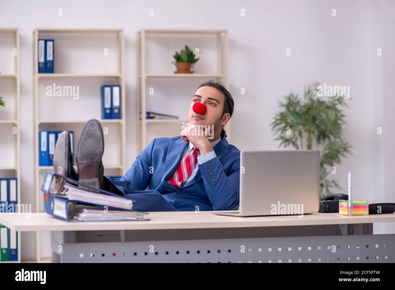 Joker thinking hi-res stock photography and images - Alamy