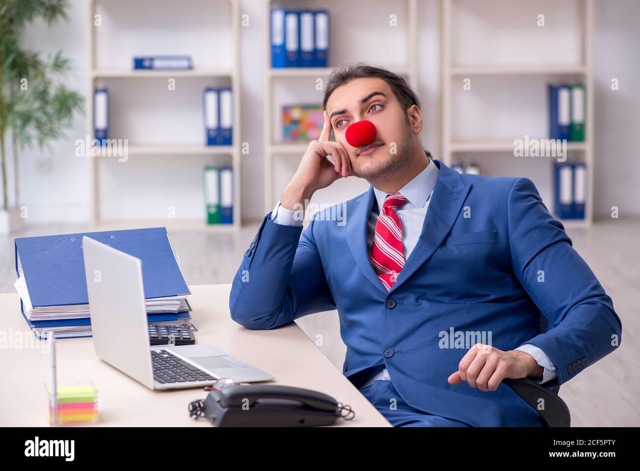 Joker thinking hi-res stock photography and images - Alamy