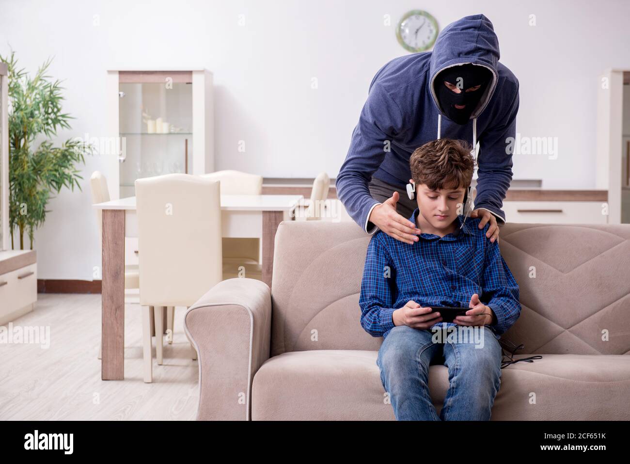 Child abduction concept with the young boy Stock Photo - Alamy