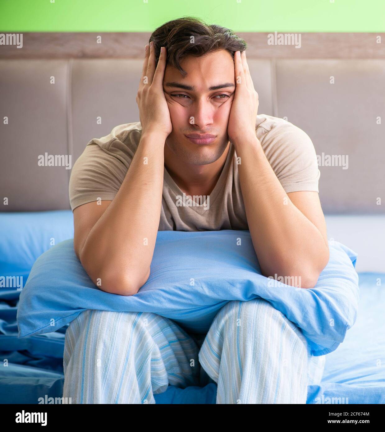 The man suffering from sleeping disorder and insomnia Stock Photo - Alamy