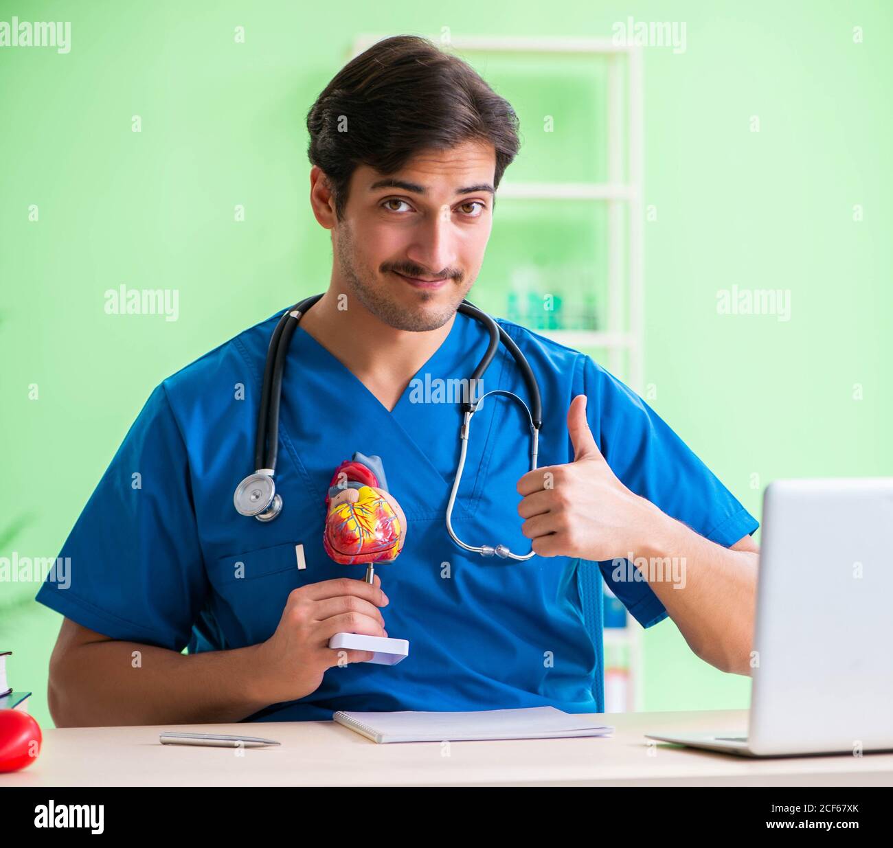 The doctor student explaining heart problems Stock Photo - Alamy