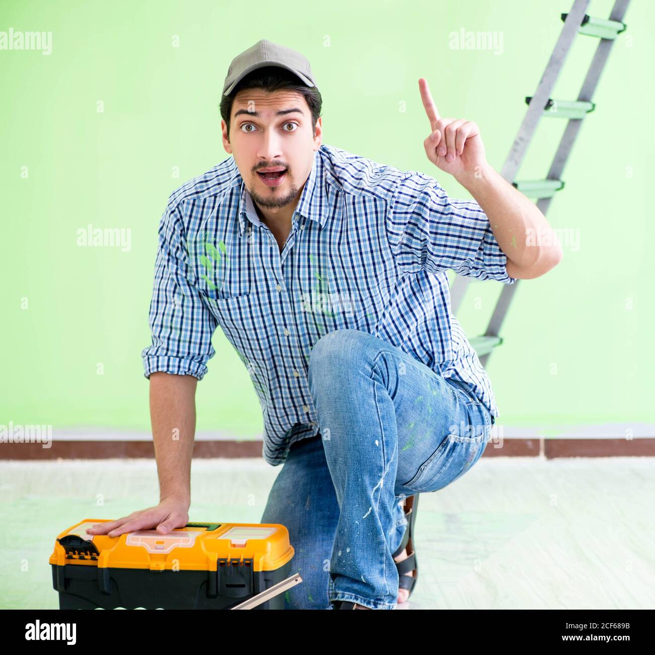 The young man doing home renovation Stock Photo - Alamy