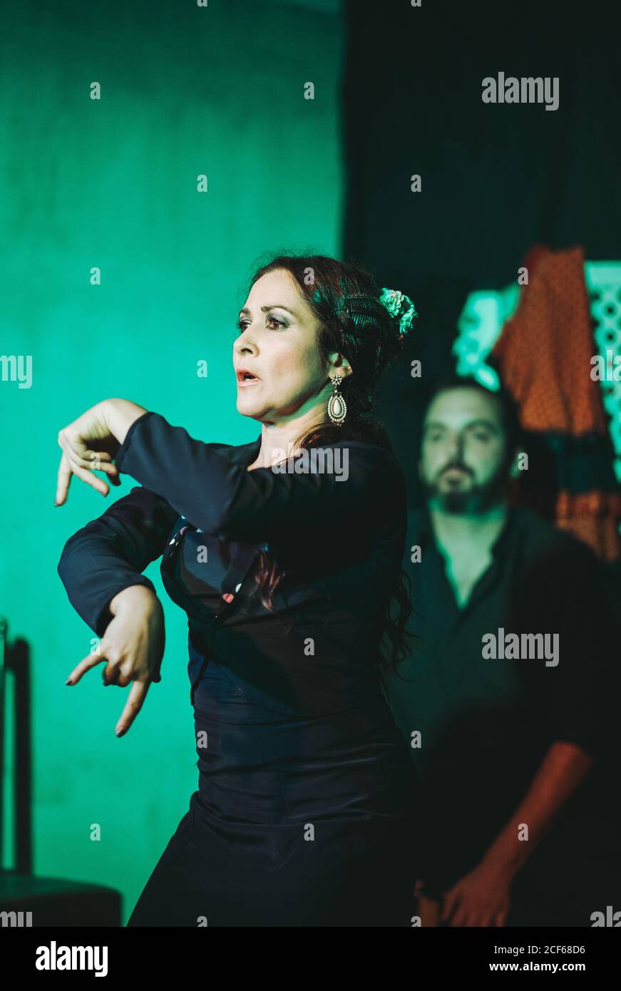 Hispanic female flamenco dancer acting on theater stage Stock Photo - Alamy