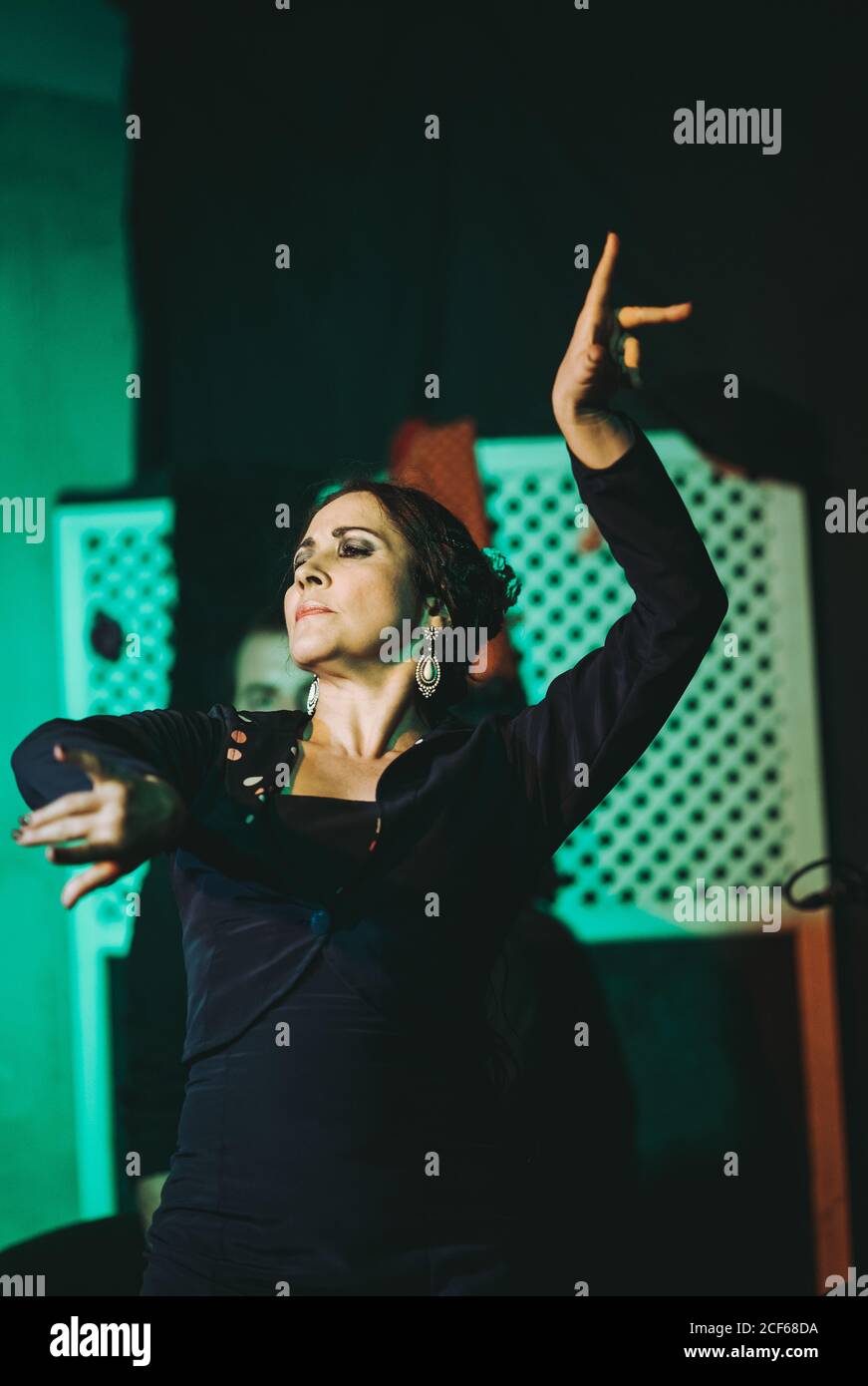 Hispanic female flamenco dancer acting on theater stage Stock Photo - Alamy