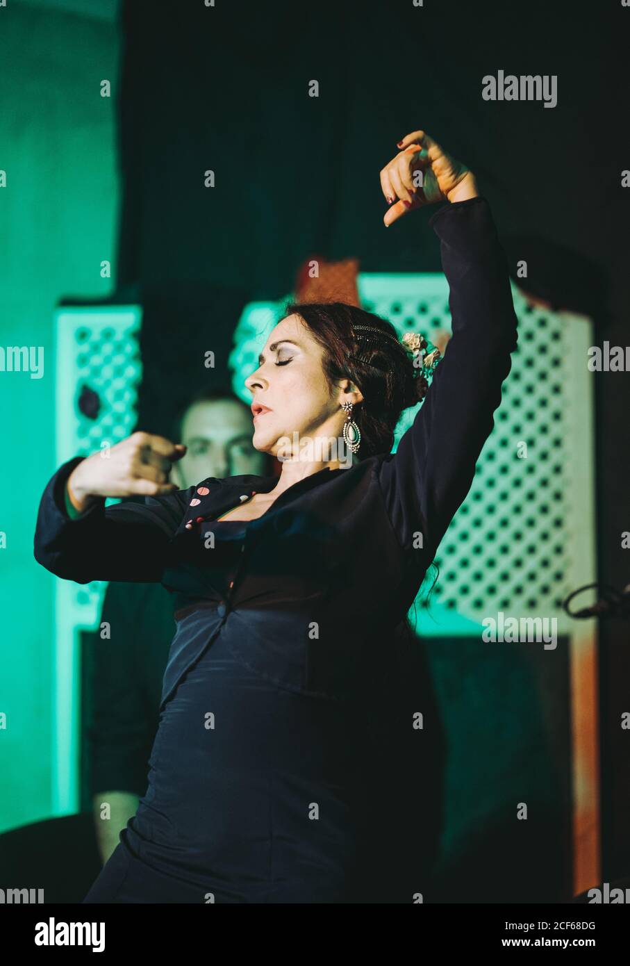 Hispanic female flamenco dancer acting on theater stage Stock Photo - Alamy