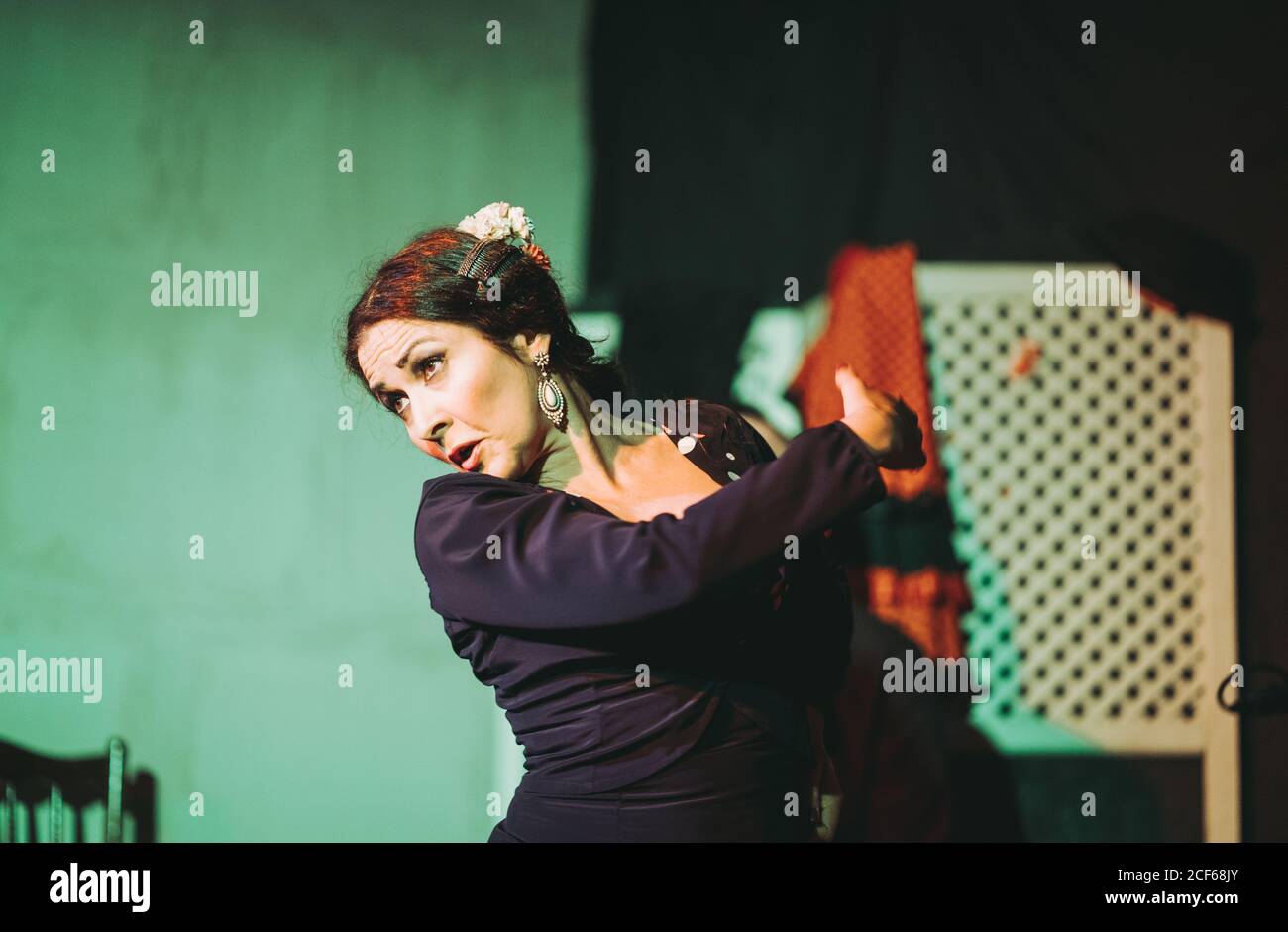Hispanic female flamenco dancer acting on theater stage Stock Photo - Alamy