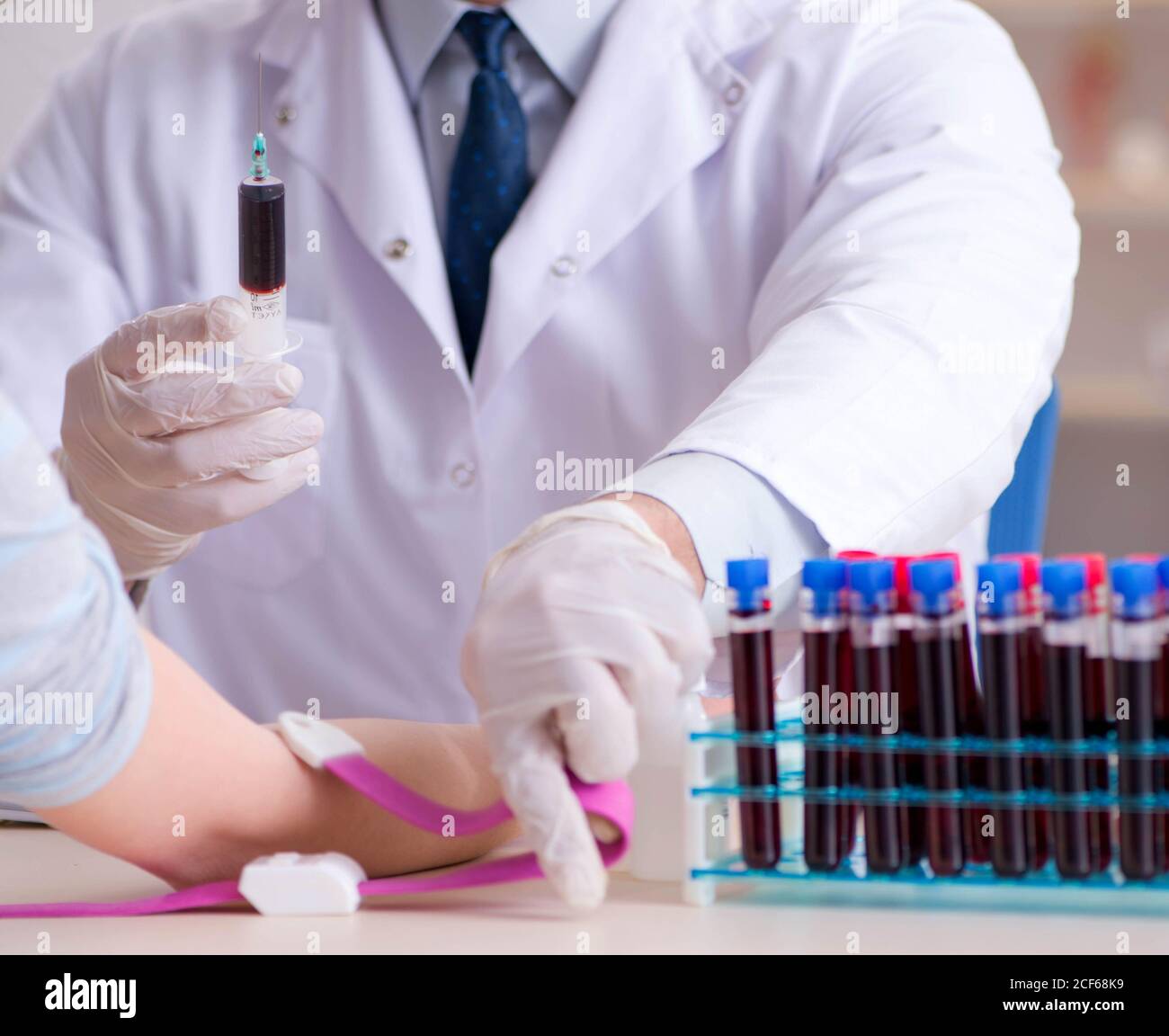 The patient during blood test sampling procedure taken for analysis ...