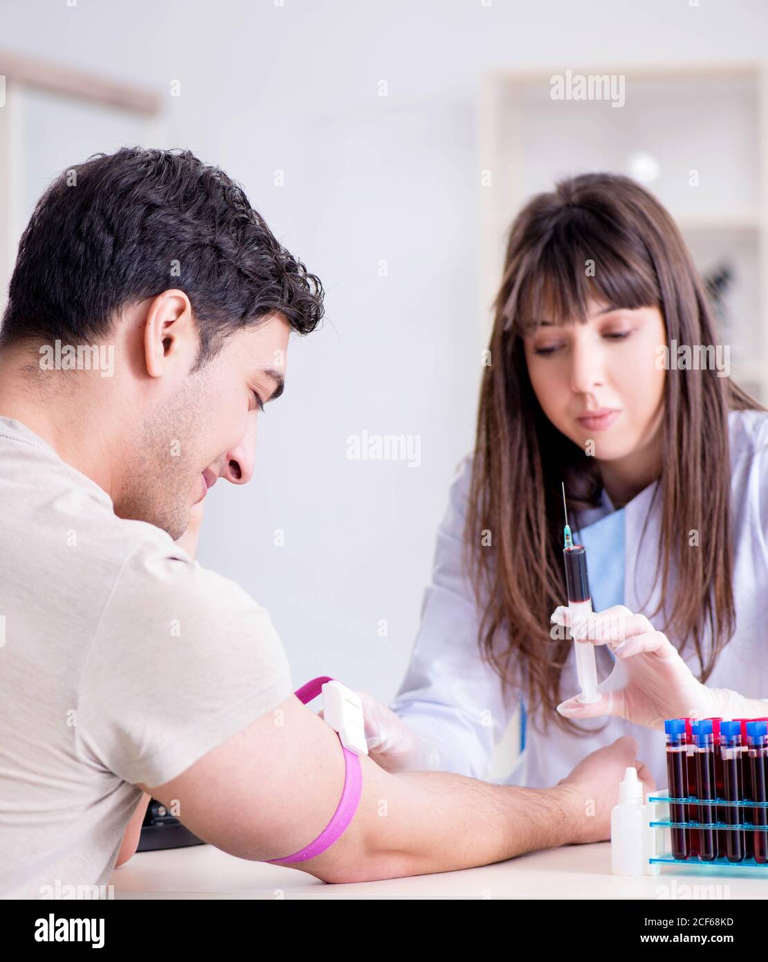 The patient during blood test sampling procedure taken for analysis ...