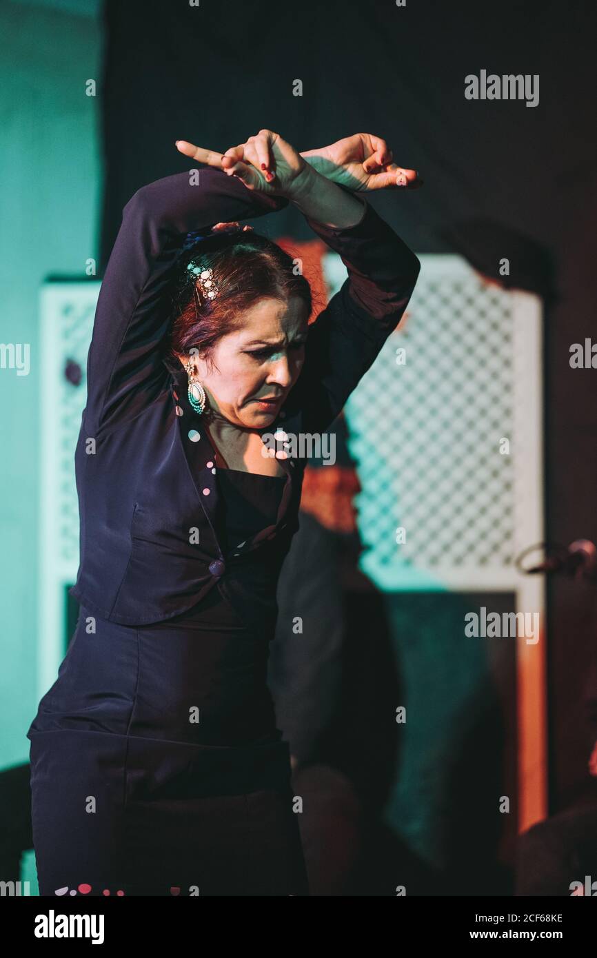 Hispanic female flamenco dancer acting on theater stage Stock Photo - Alamy