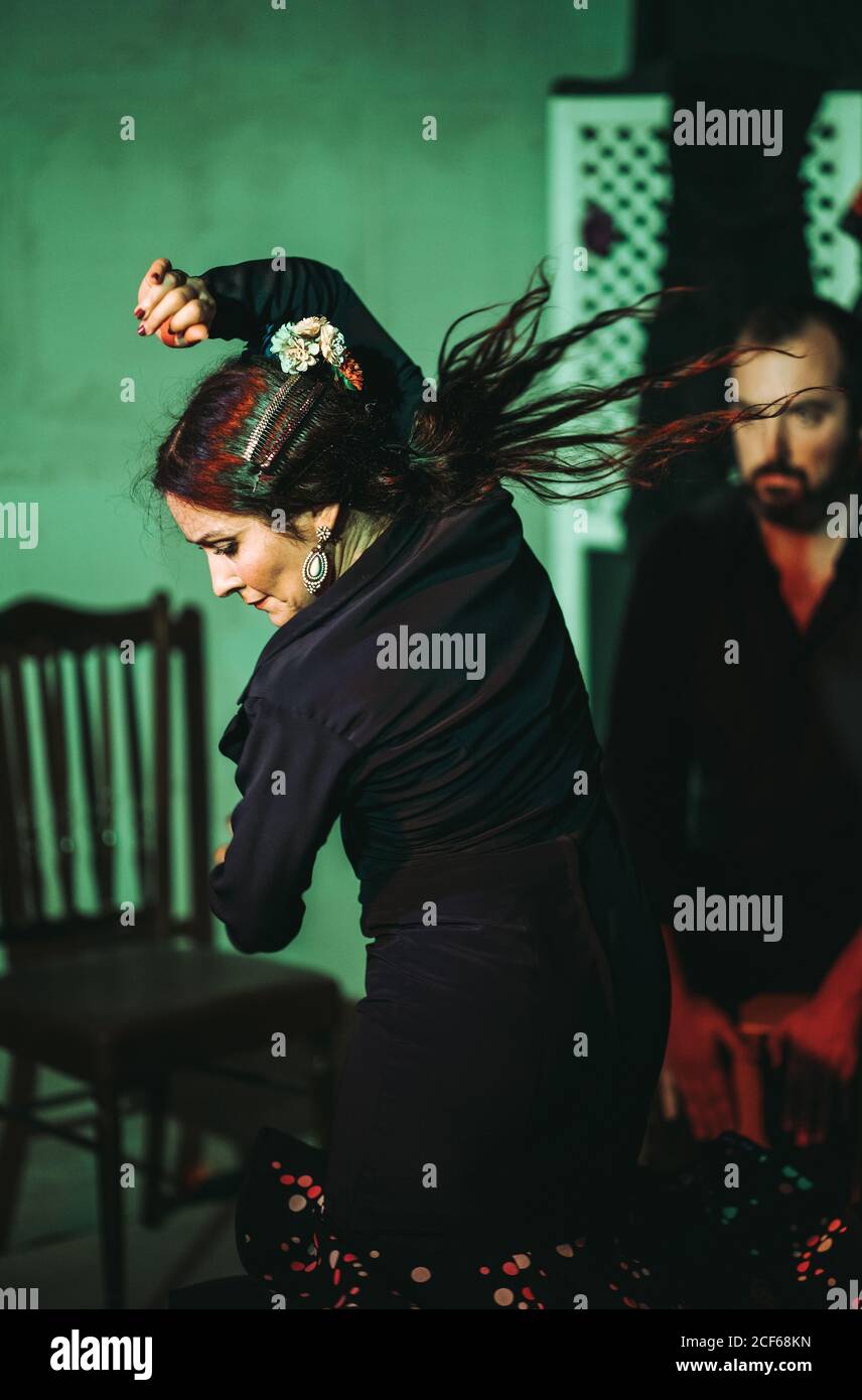 Hispanic female flamenco dancer acting on theater stage Stock Photo - Alamy