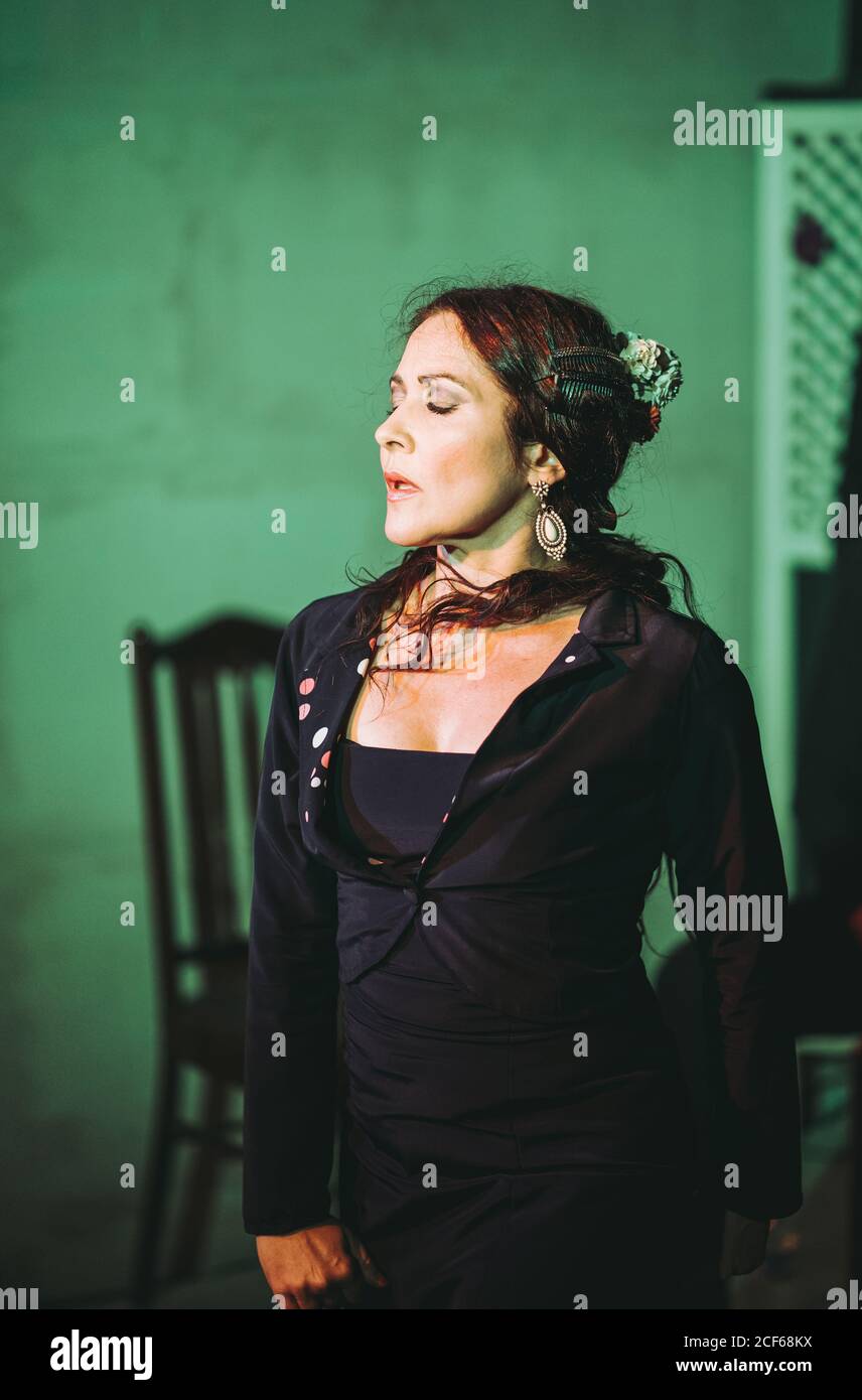 Hispanic female flamenco dancer acting on theater stage Stock Photo - Alamy