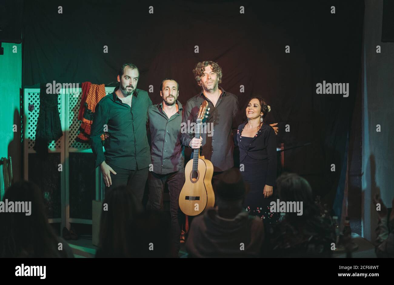 Hispanic artists giving flamenco performance on theater stage Stock ...