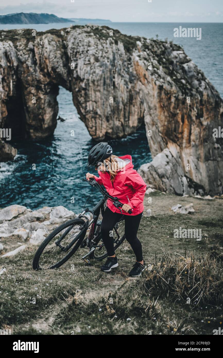 Woman bicycle cliff young hi-res stock photography and images - Alamy