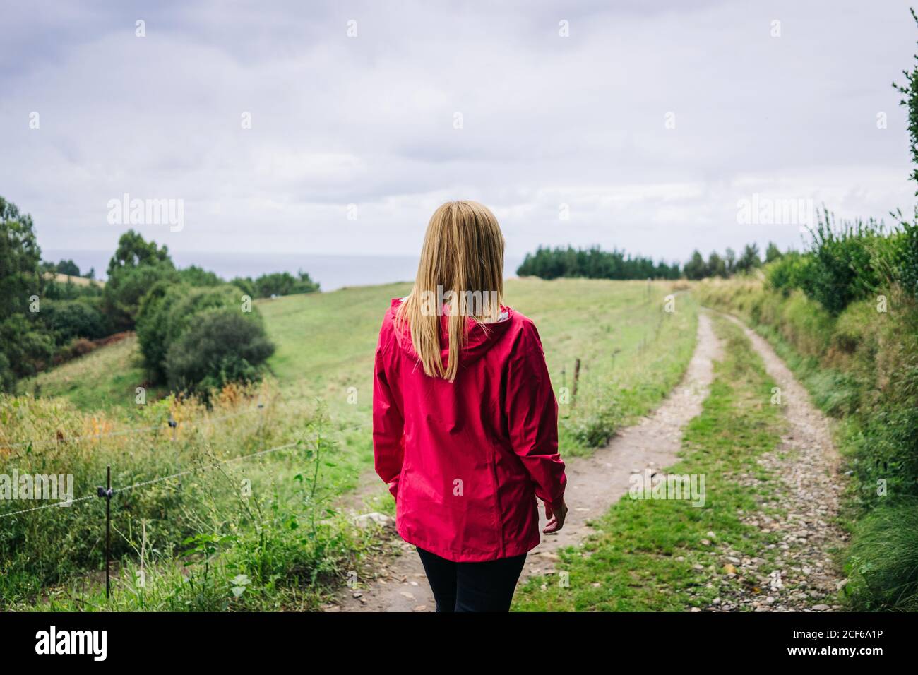 Woman standing countryside looking on hi-res stock photography and ...