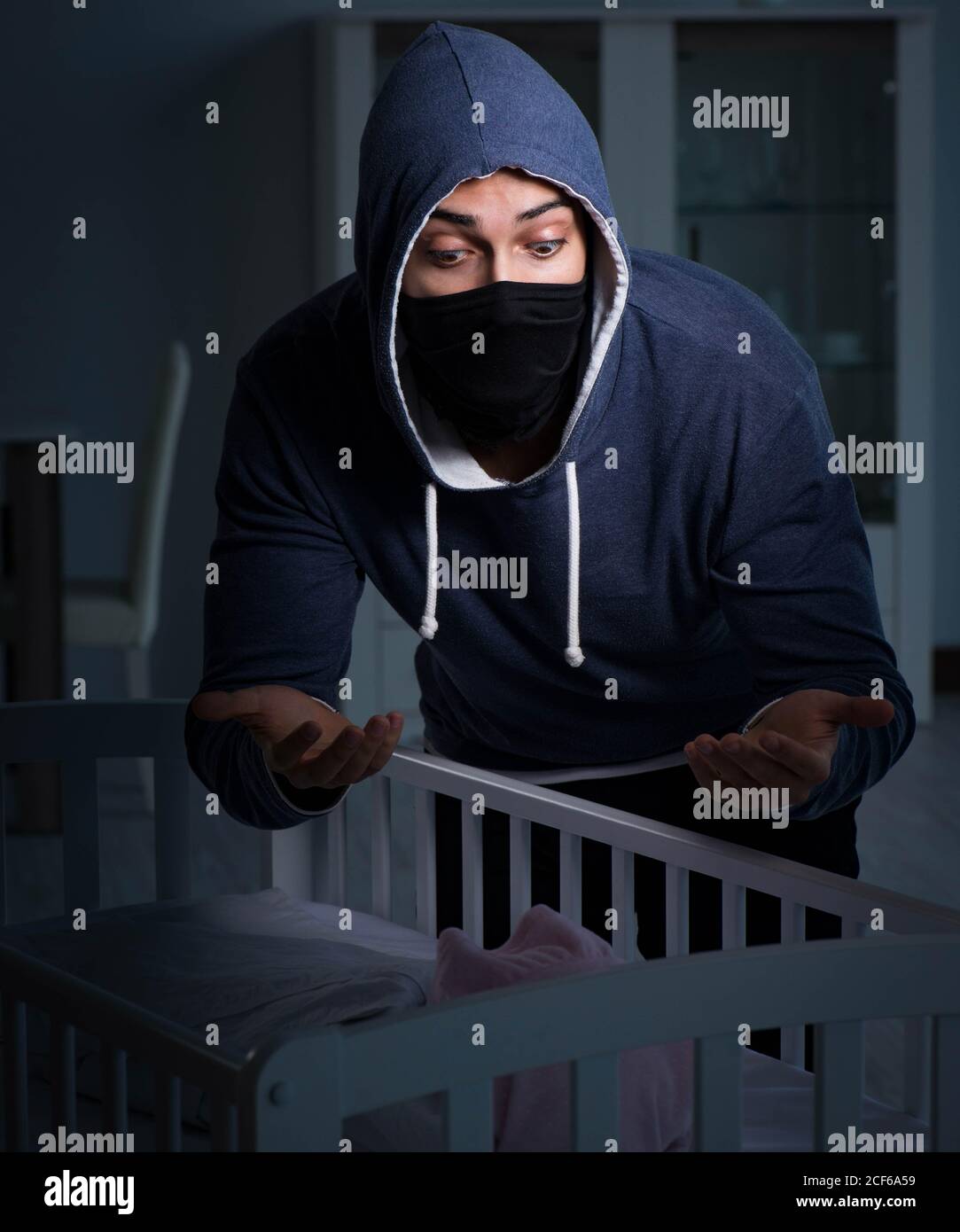 Scared kid in prisoner hi-res stock photography and images - Alamy
