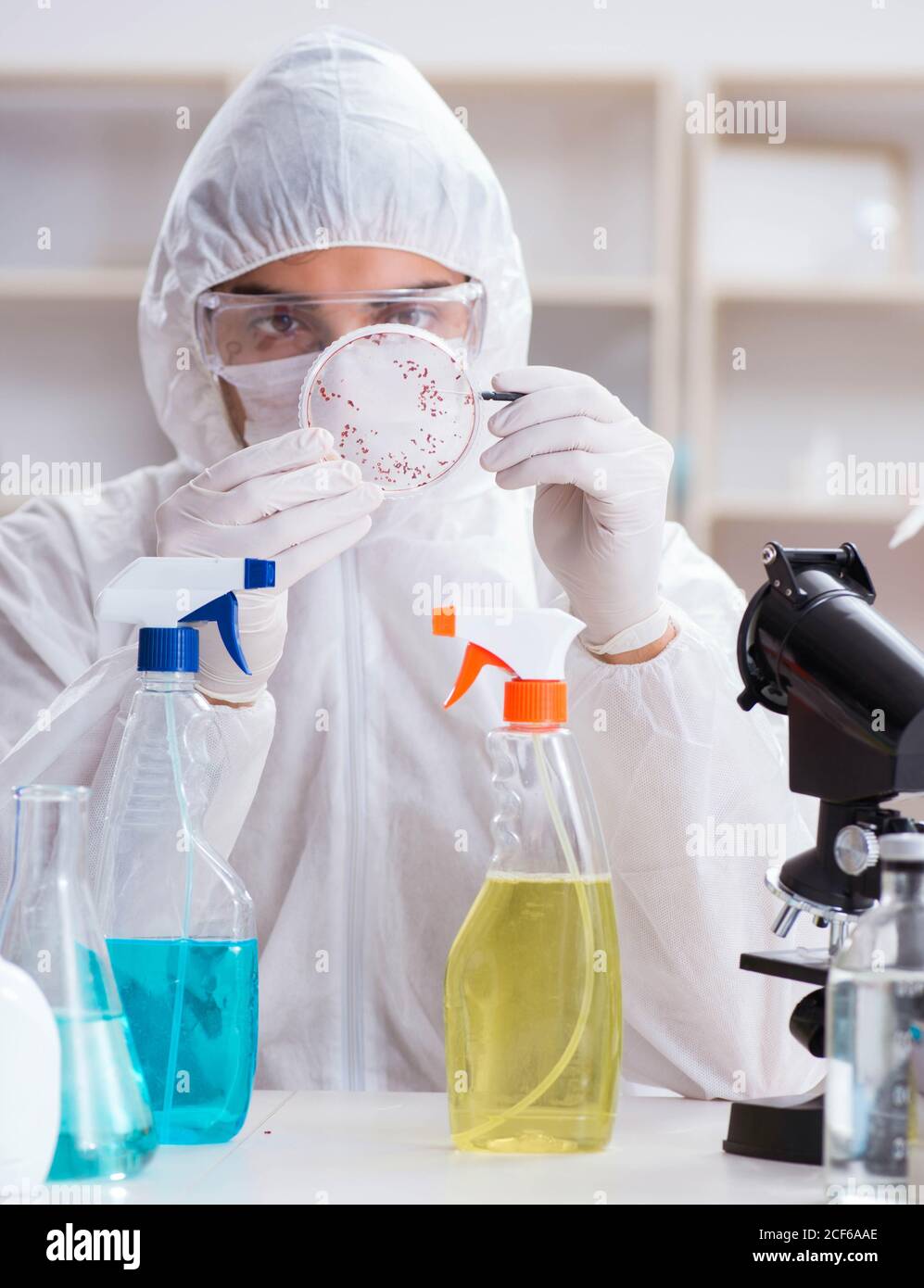The chemist testing chemical substances in lab Stock Photo - Alamy