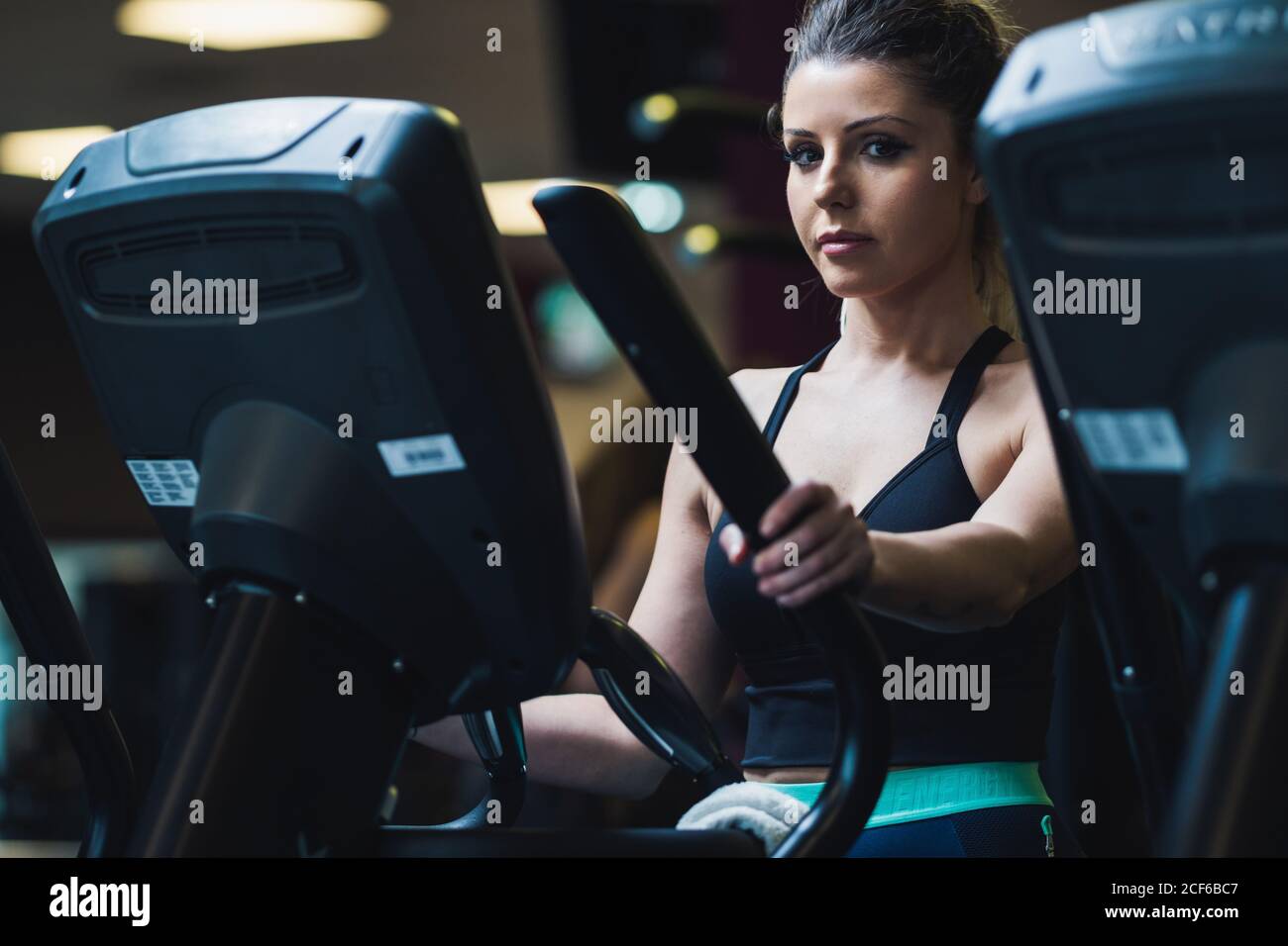 Woman walking on climbing machine hi-res stock photography and images ...