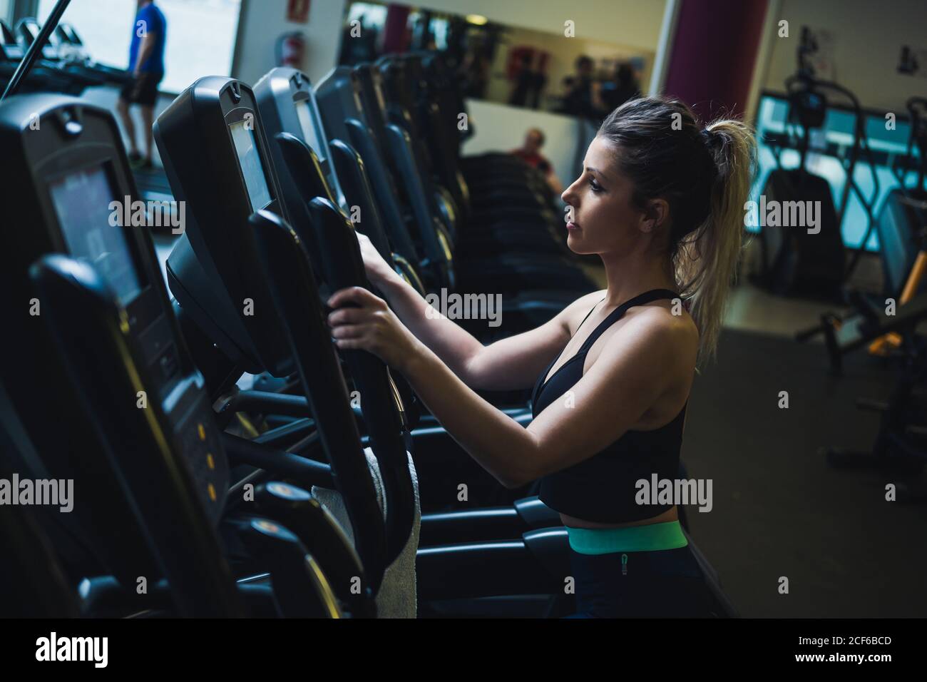 Pretty fitness woman walking on hi-res stock photography and images - Alamy