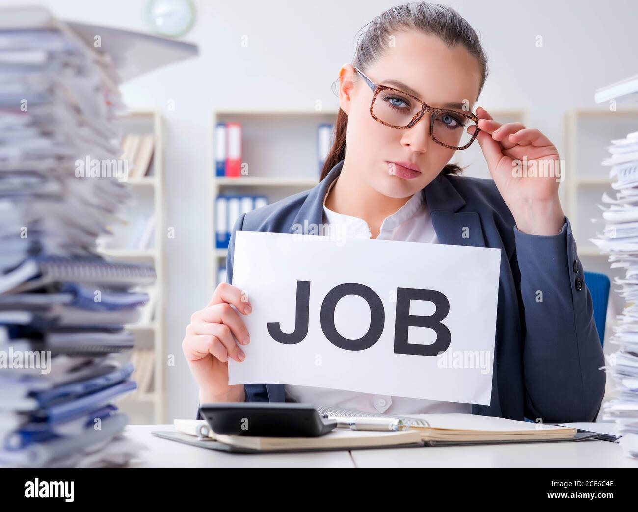 Businesswoman not coping with workload and resigning Stock Photo - Alamy