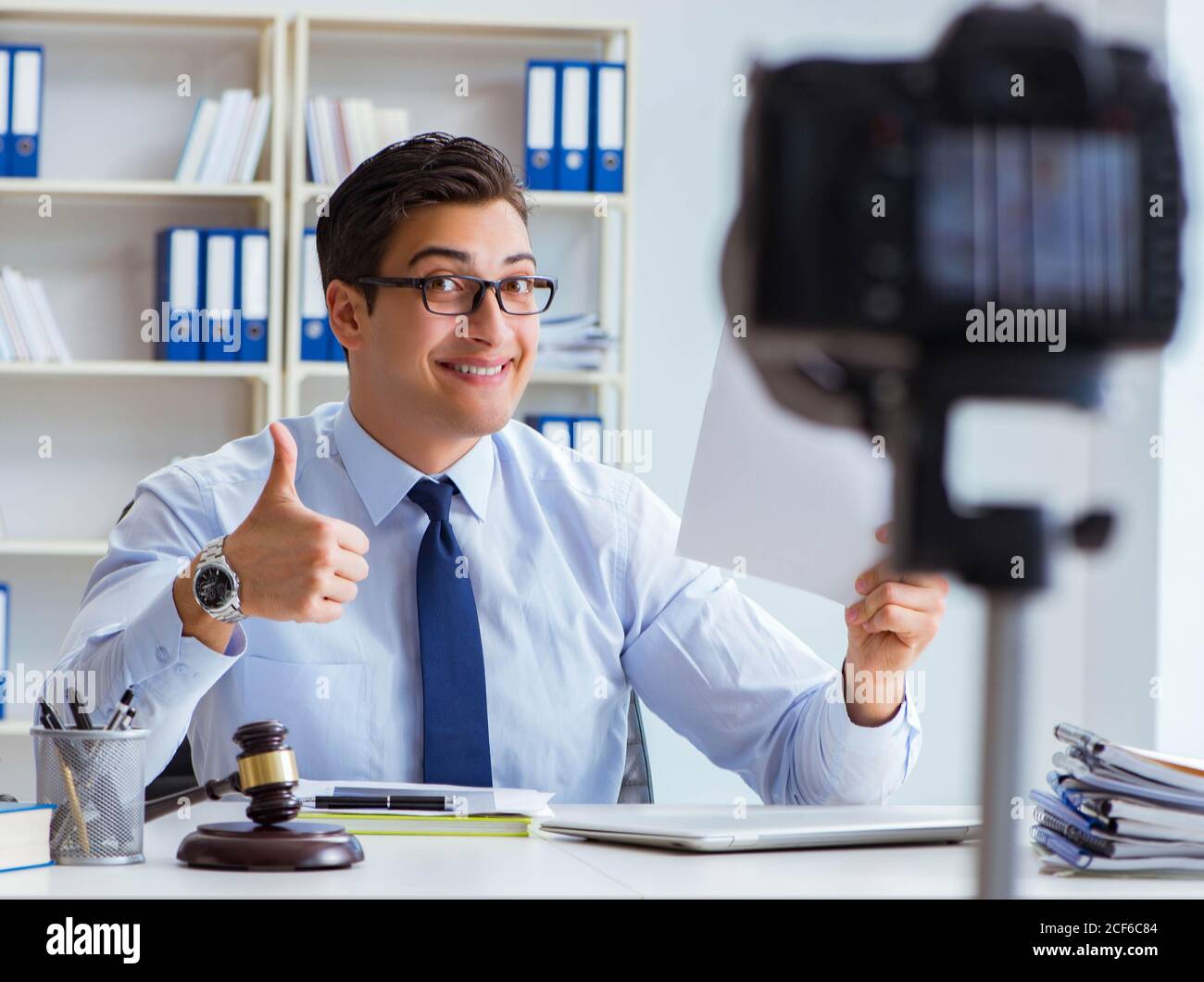 The lawyer doing legal webcast for channel subscribers Stock Photo - Alamy