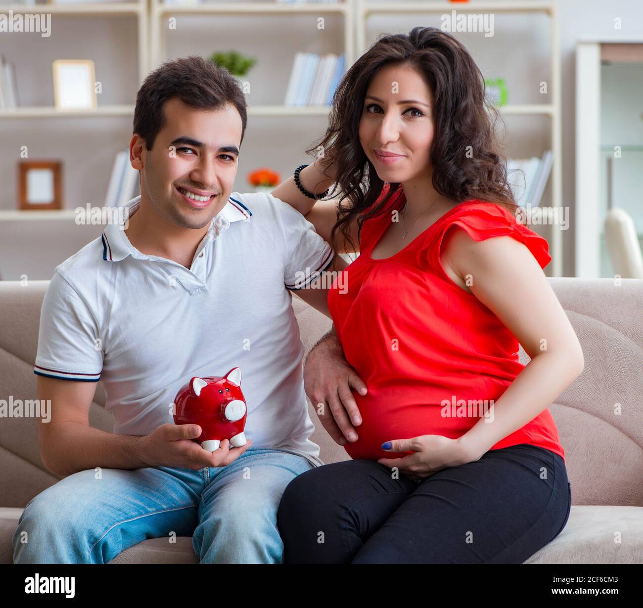 Young couple family expecting a baby Stock Photo - Alamy