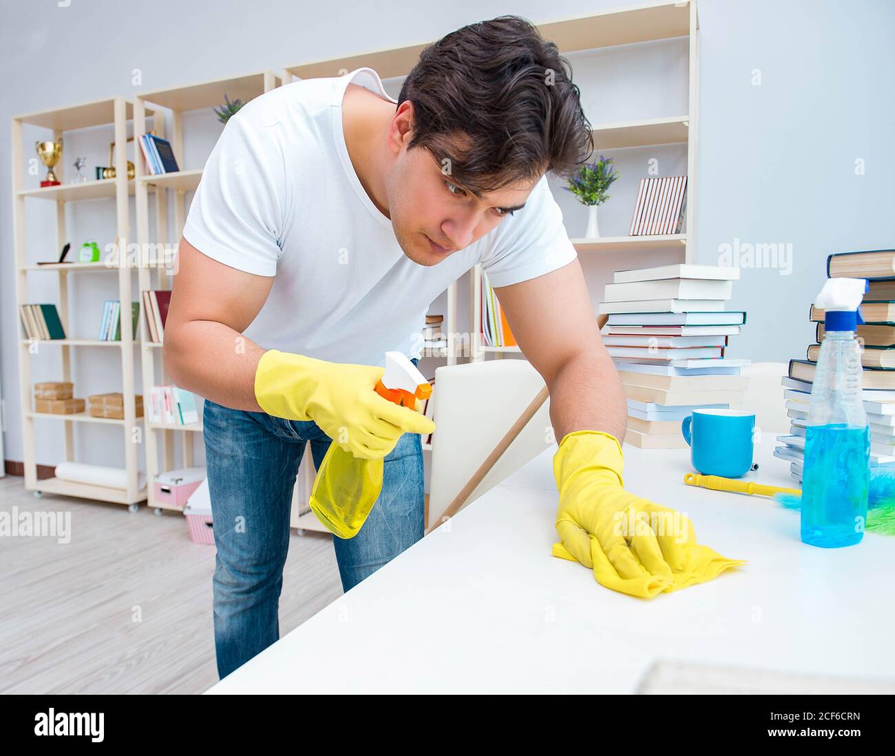 The man doing cleaning at home Stock Photo - Alamy