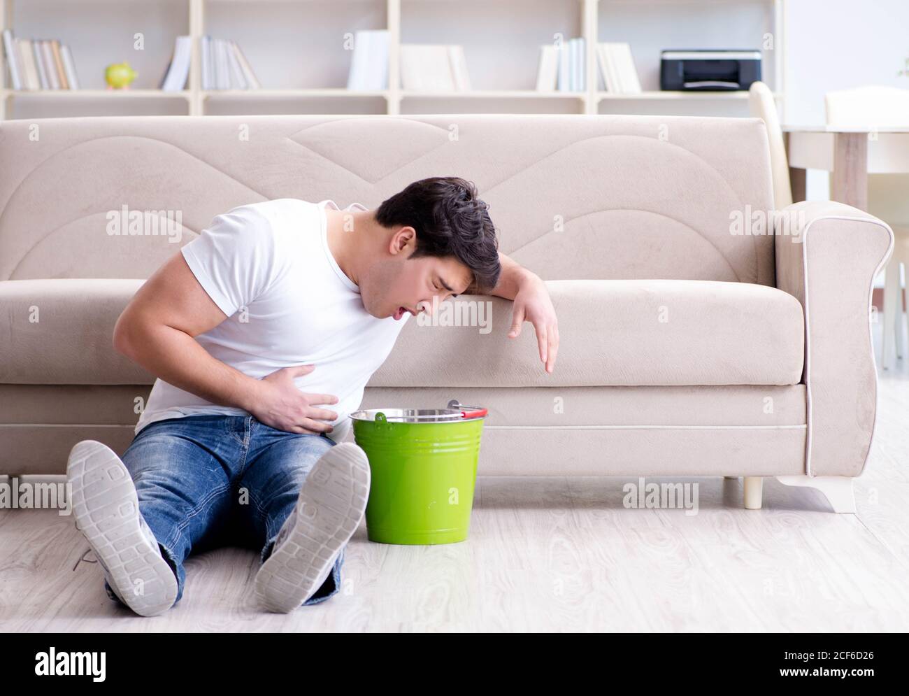 Man suffering from sick stomach and vomiting Stock Photo - Alamy