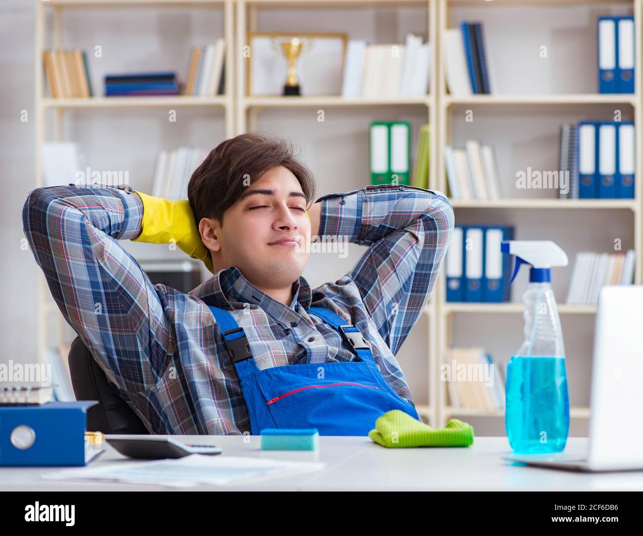 Office cleaner working in the office Stock Photo - Alamy