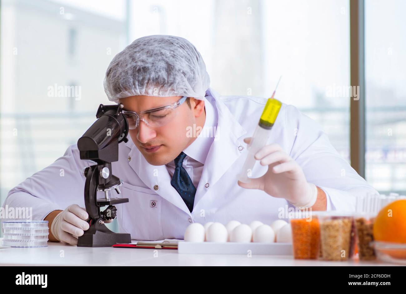 Nutrition expert testing food products in lab Stock Photo - Alamy
