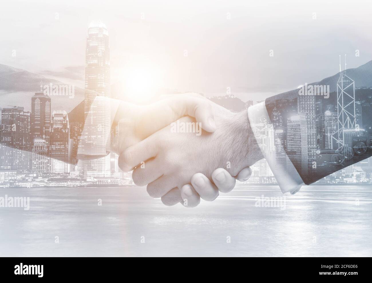The concept of cooperation with handshake Stock Photo - Alamy