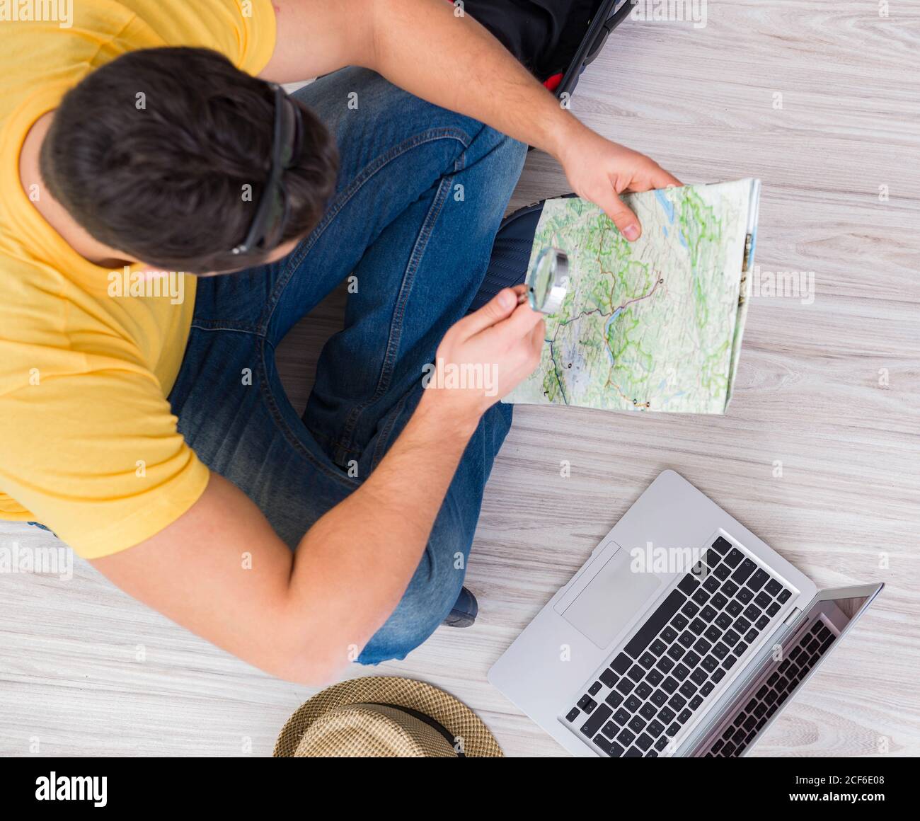 The man planning his vacation trip with map Stock Photo - Alamy