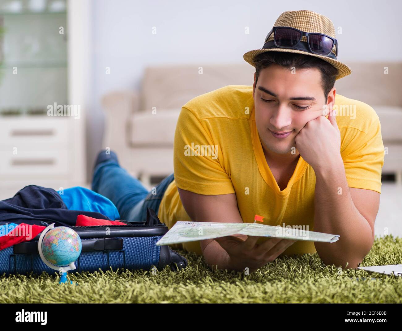 The man planning his vacation trip with map Stock Photo - Alamy