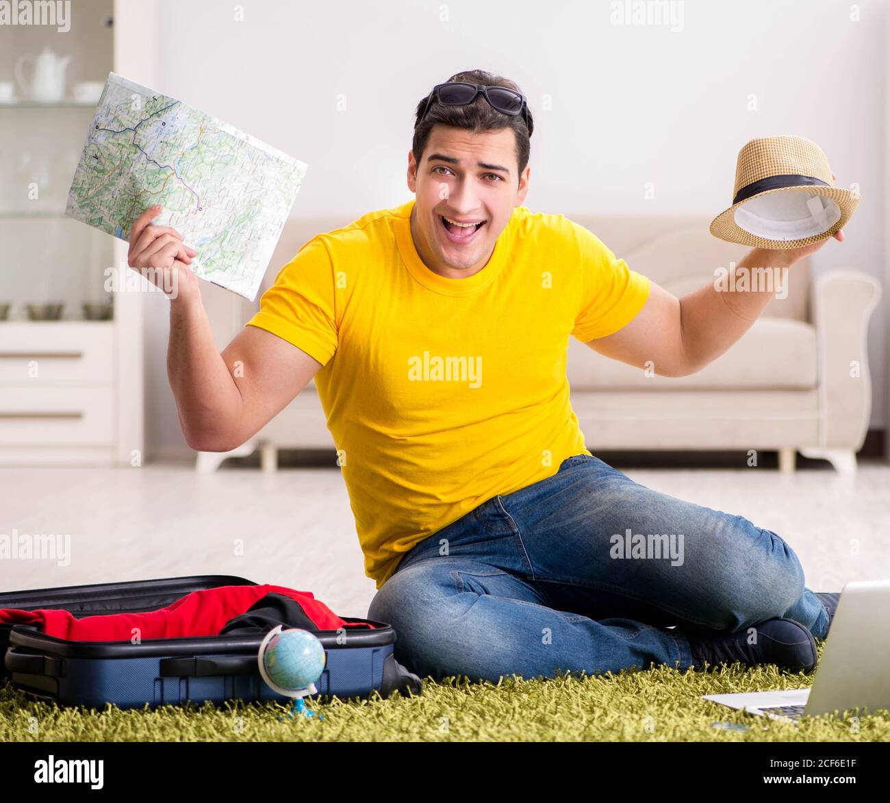 Man planning his vacation trip with map Stock Photo - Alamy