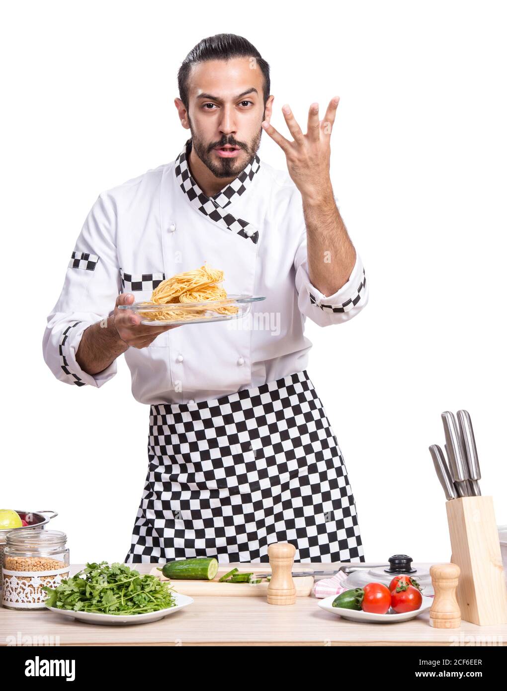 The funny male cook isolated on the white background Stock Photo - Alamy