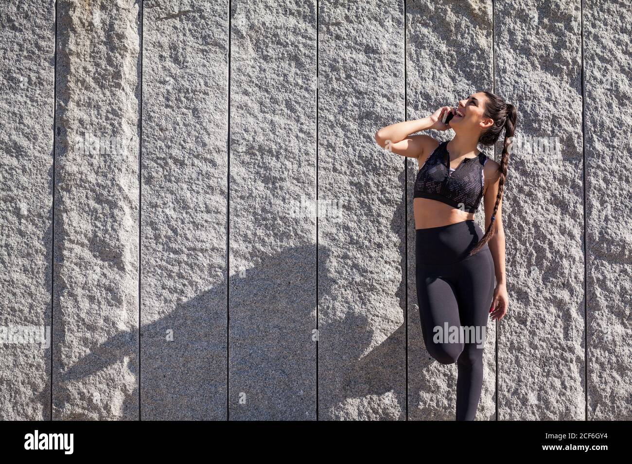 Women Leaning Against Wall On High Resolution Stock Photography and ...