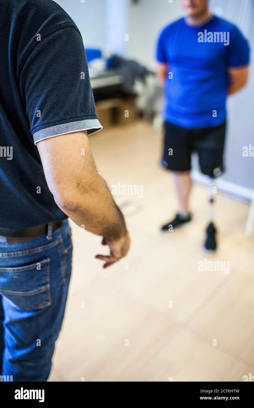 amputated young man testing the new leg prosthesis Stock Photo - Alamy