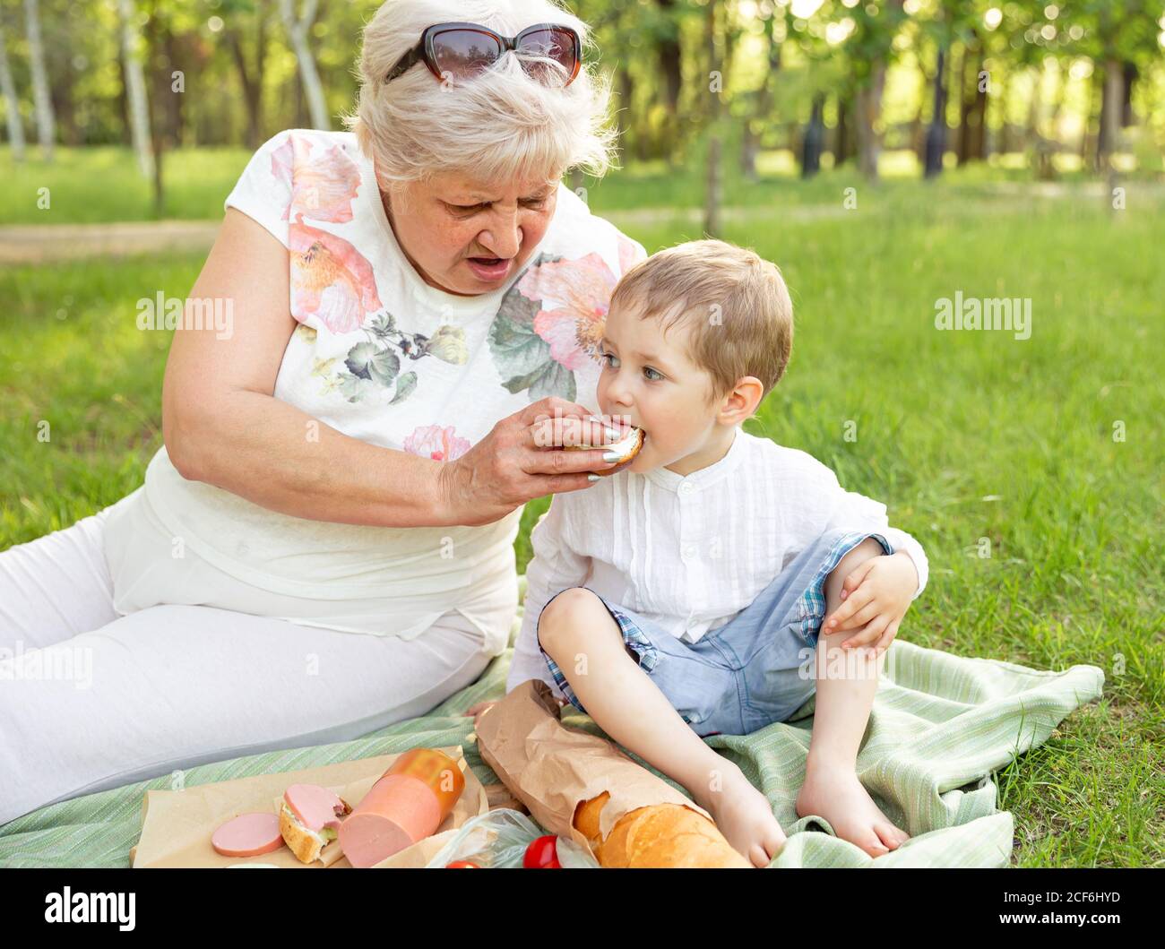 Grandmother grandson enjoy joyful moment hi-res stock photography and ...