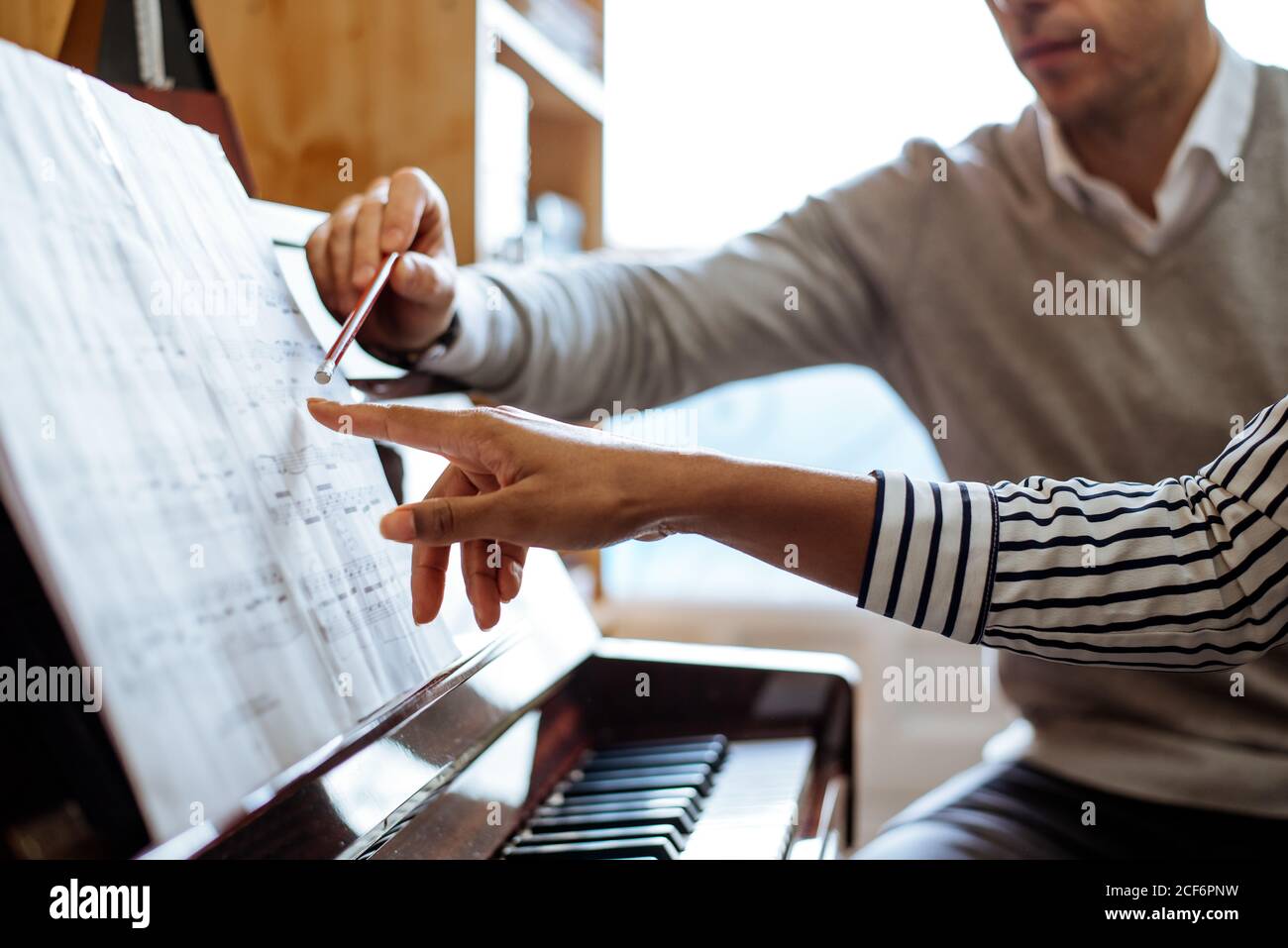 Student learning piano hi-res stock photography and images - Alamy
