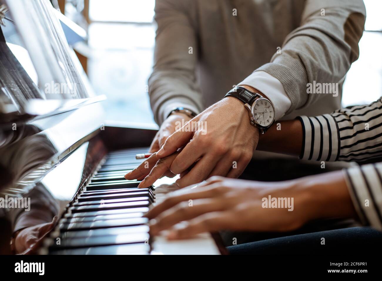 Male student learning piano teacher hi-res stock photography and images ...