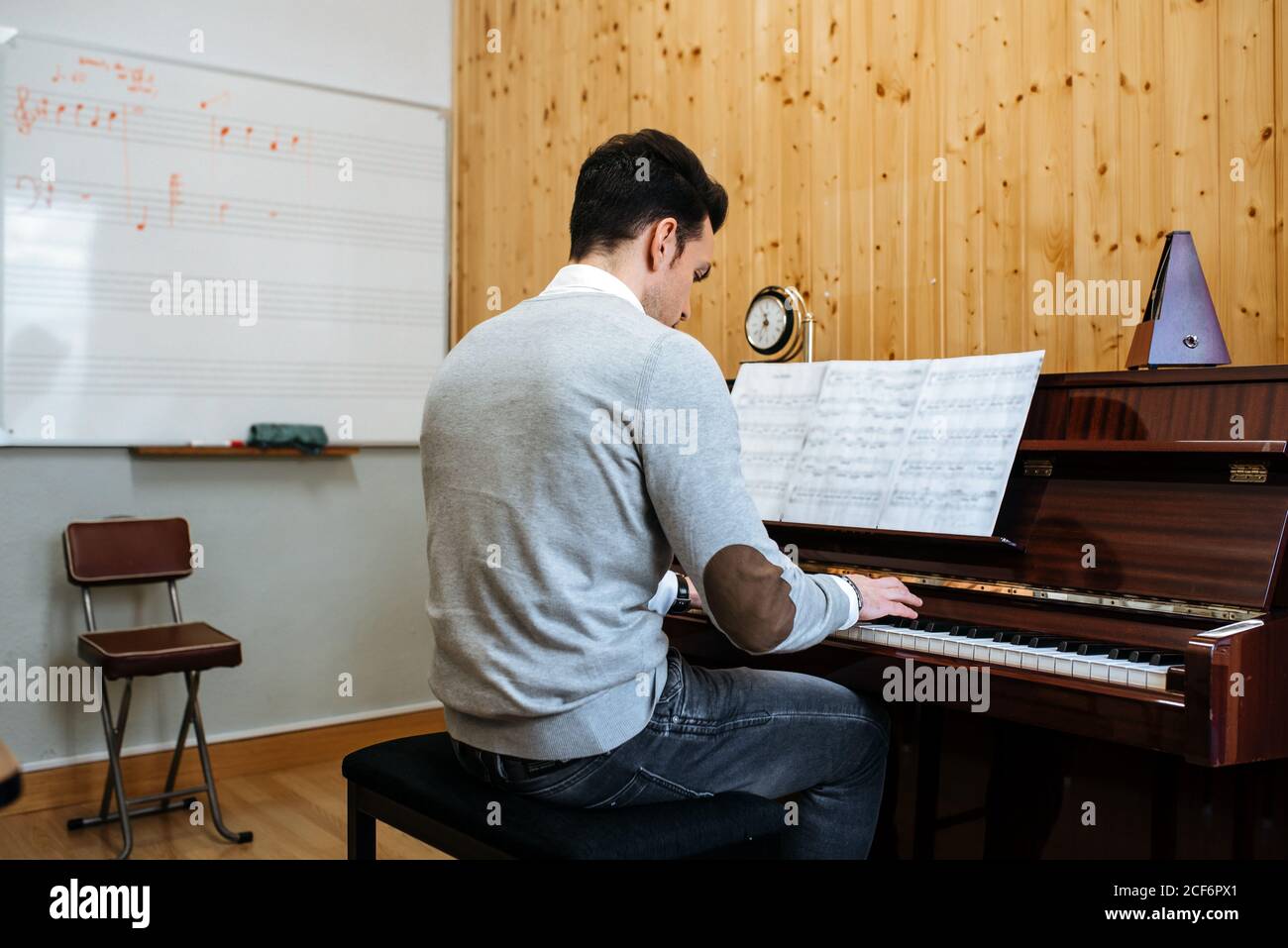 Man Playing Piano Back High Resolution Stock Photography and Images - Alamy