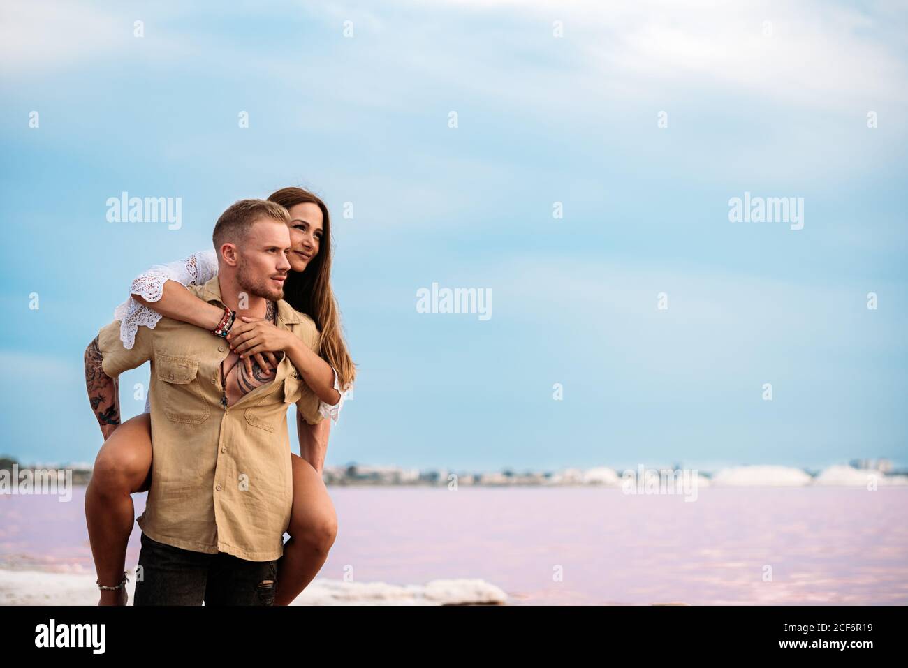 Piggyback ride beach hi-res stock photography and images - Alamy